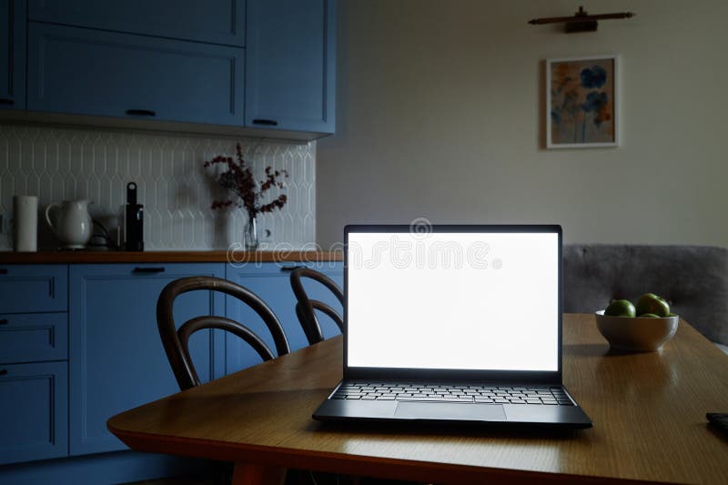 Bright Laptop Screen Illuminating Modern Kitchen Setting Stock Image ...
