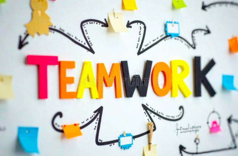 Bright Letters Spelling Teamwork Stand Out on a Board Surrounded by ...