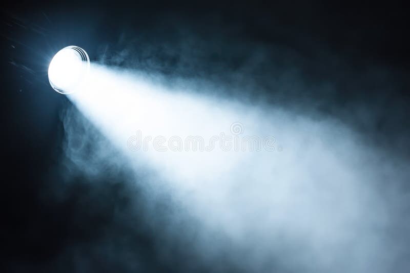 Bright Light Beam Cutting through Dark Smoke in a Dimly Lit Environment ...
