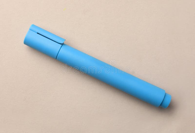 Bright Light Blue Marker on Beige Background, Top View Stock Photo ...