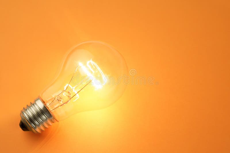 Golden Light Bulb Electric stock photo. Image of ideas - 4974440