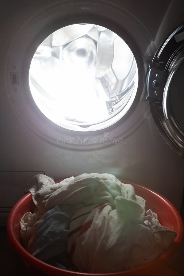 Bright Light Comes from the Hatch of the Washing Machine Stock Photo ...