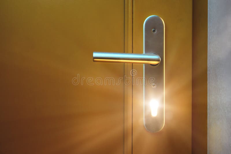 Bright Light Shining through a Keyhole of a Door Stock Photo - Image of ...