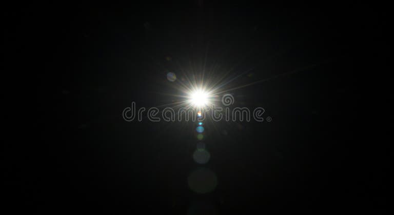 Bright Light Source Centered Against a Black Background Creates a ...
