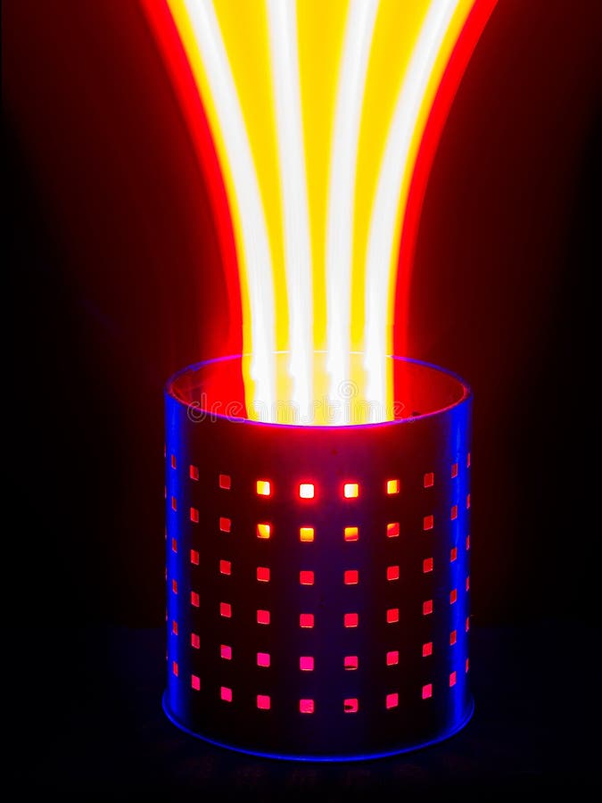 Bright Light Source Erupts from Metal Lamp on Dark Background. Magic ...