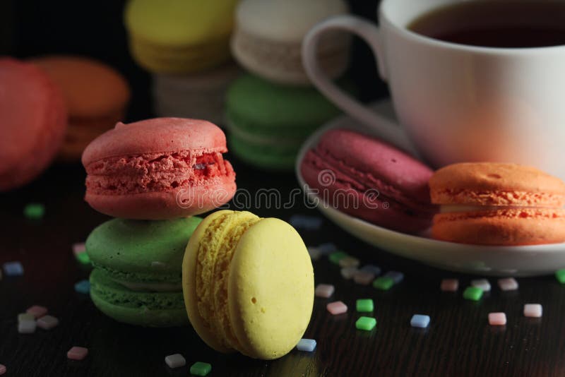 Bright Macaroons Against Dark Background Stock Photo - Image of gourmet ...