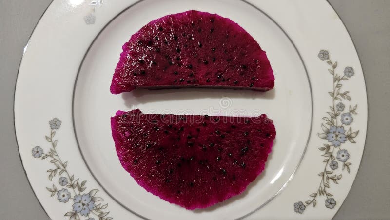 Bright Magenta Half-circle Slice with Small Black Seeds in the Dragon ...