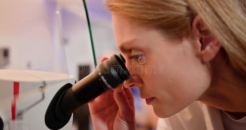 In Bright Medical Science Laboratory: Beautiful Microbiologist Looks ...