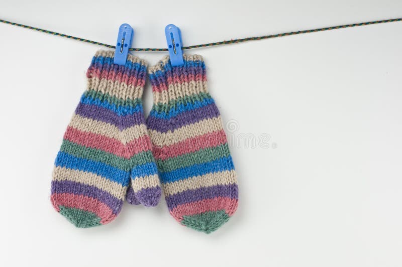 Bright Mittens Hanging on a Line Stock Image - Image of knitting, knit ...