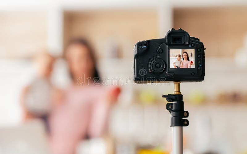 Woman Recording Cooking Tutorial in Modern Kitchen during Daytime Stock ...