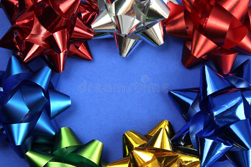 Bright Multi-colored Bows in the Form of Stars on a Blue Background ...