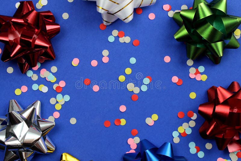 Bright Multi-colored Bows in the Form of Stars on a Blue Background ...