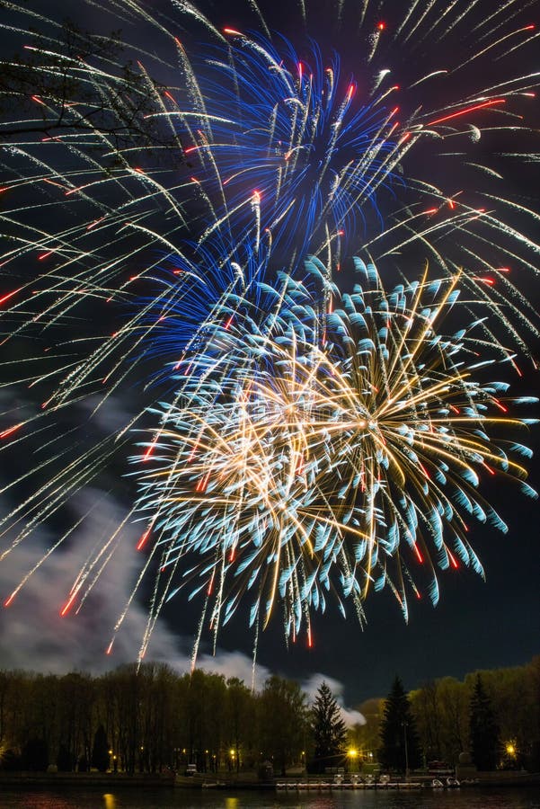 Bright Multi-colored Fireworks Lights Stock Photo - Image of water ...