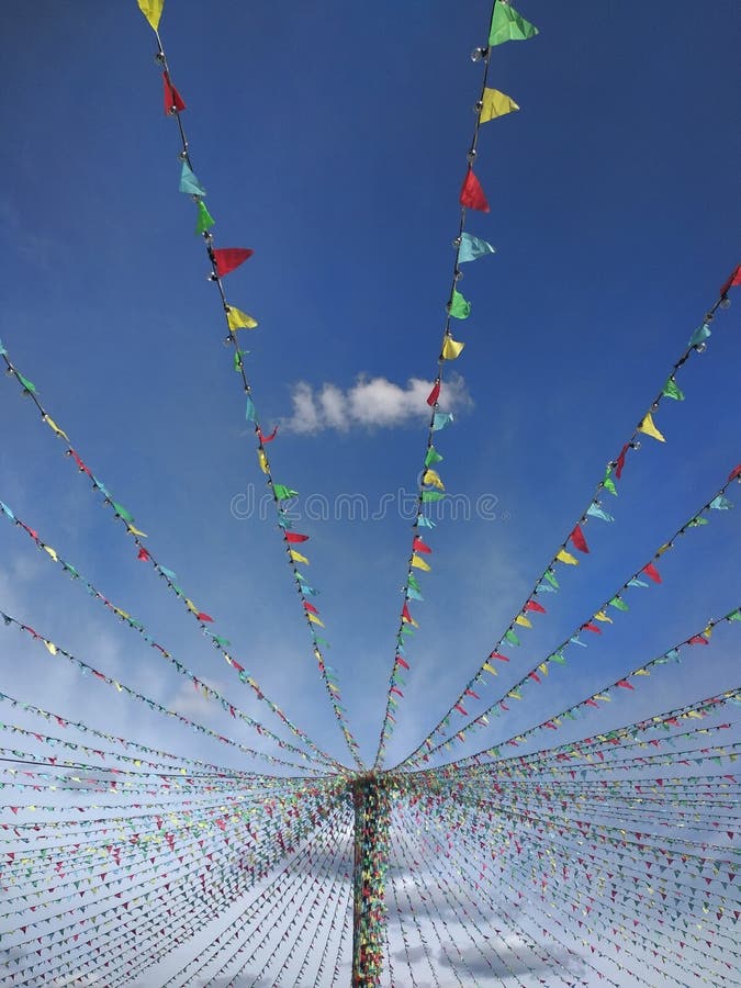 Bright, Multi-colored Flags on a Blue Sky Background. Stock Photo ...