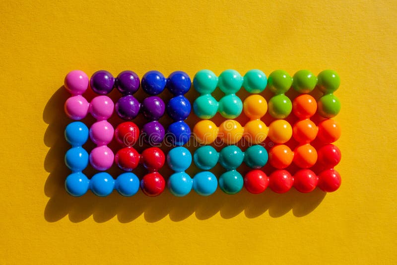 Rectangle of Parts of Different Colors on a Yellow Background Stock ...