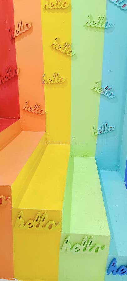 A Bright Multi Colored Wall with the Words Hello for a Photo Backdrop ...