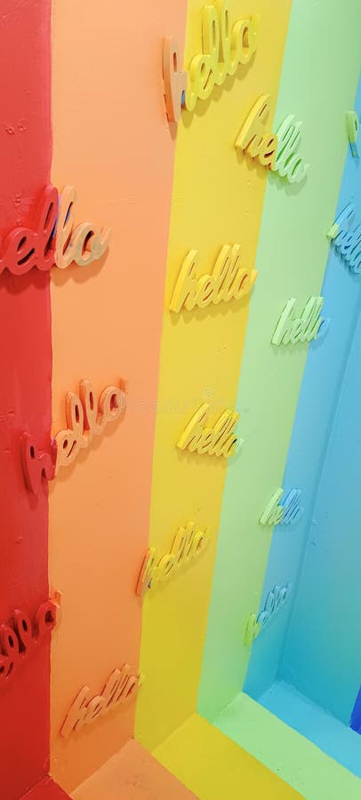 A Bright Multi Colored Wall with the Words Hello for a Photo Backdrop ...