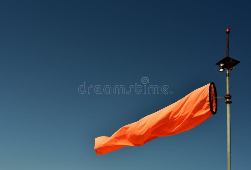 Bright Neon Orange Wind Sock Blowing Indicating Wind Stock Image ...
