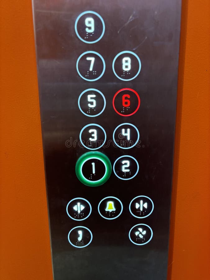 A Bright Orange Elevator with Round Buttons Stock Image - Image of ...