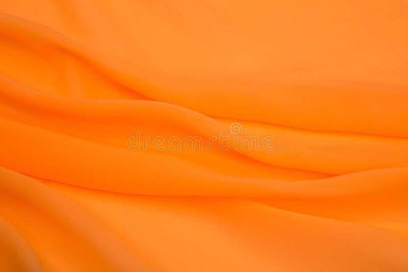 Bright Orange Fabric Lined with Soft Folds Stock Image - Image of ...