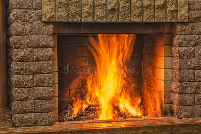 Bright Orange Fire in a Burning before Cozy Fireplace Stock Image ...