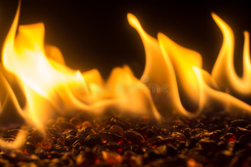 Bright Orange Fire on Red Glass Stones Stock Image - Image of burn ...
