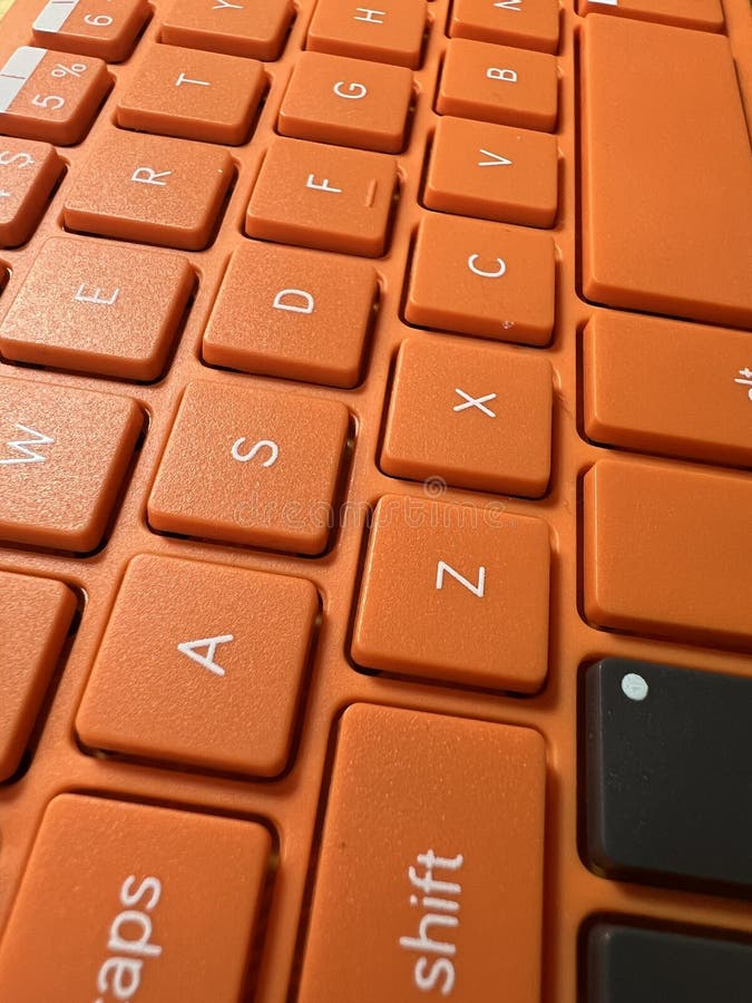 Bright Orange Computer Keyboard—Close-Up of Vibrant Tech Accessory ...