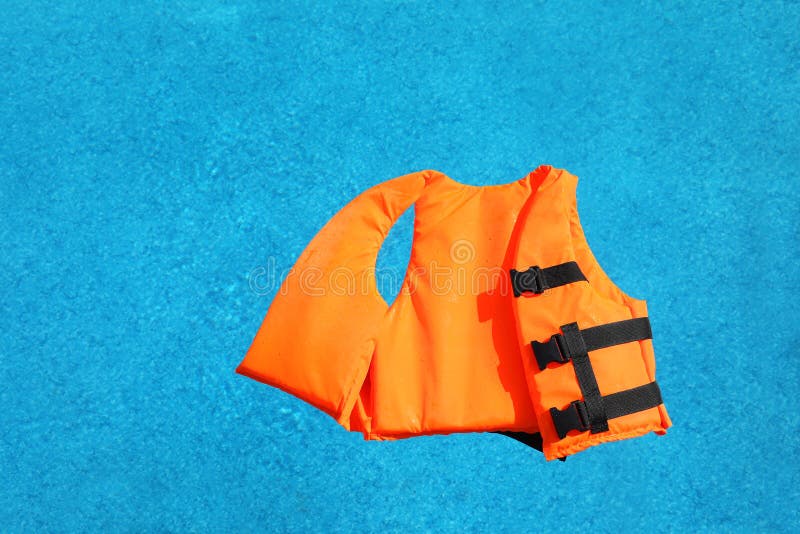 Bright Orange Life Jacket Floating in Swimming Pool, Top View Stock ...