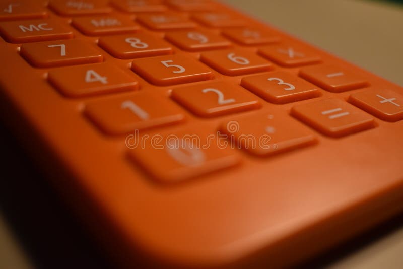 Bright Orange Math Calculator Stock Photo - Image of bottom, blurred ...