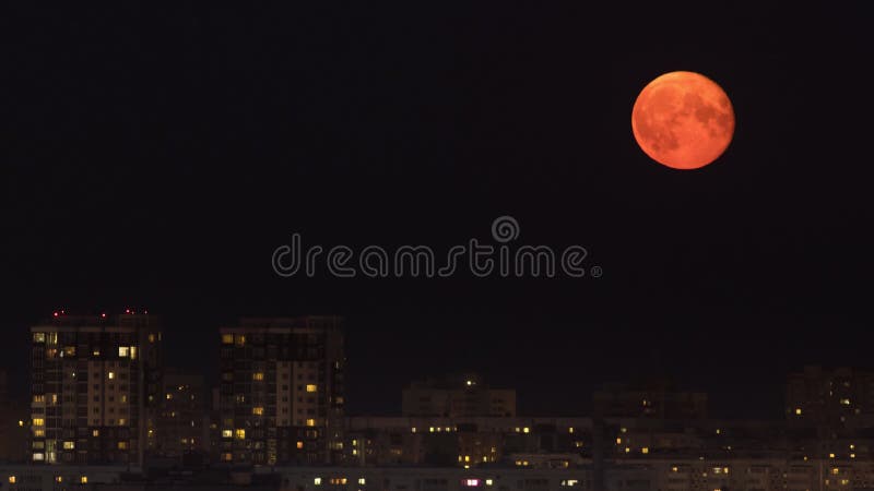 Orange Moon Passing Clounds at Night.Full Moon at Night with Cloud Real ...