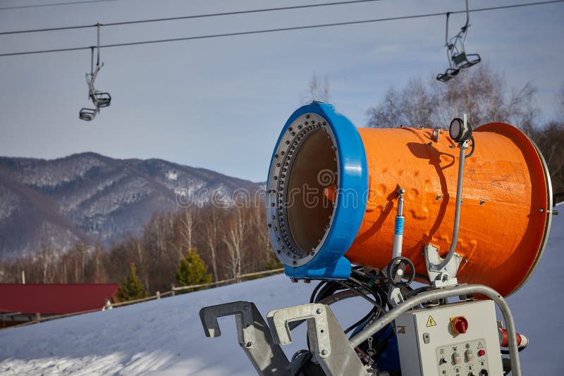 Bright Orange Snow Cannon in the Mountains in Winter Stock Photo ...
