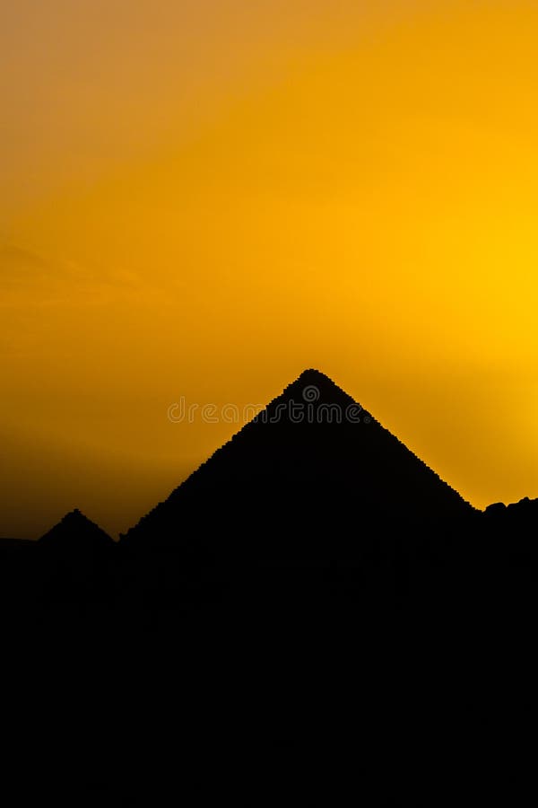 Bright Orange Sunset on the Giza Pyramids in Egypt. Sunset in Cairo ...