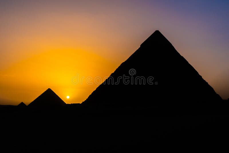 Bright Orange Sunset on the Giza Pyramids in Egypt. Sunset in Cairo ...