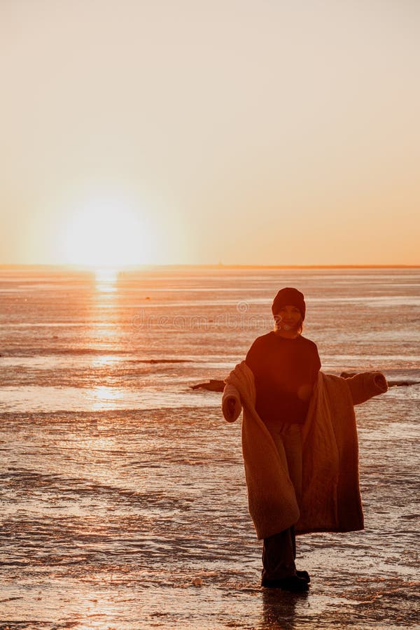 Bright Orange Sunset in Winter and Girl in Coat Out of Focus Stock ...
