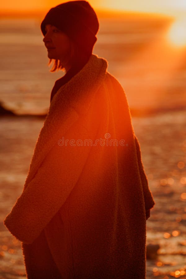 Bright Orange Sunset in Winter and Girl in Coat Out of Focus Stock ...
