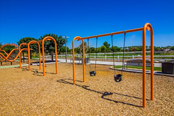 Bright Orange Swing Sets at Public Park Stock Photo - Image of outdoors ...
