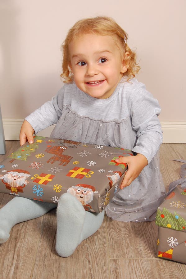 Happy child with gift box. stock image. Image of kids - 131485739