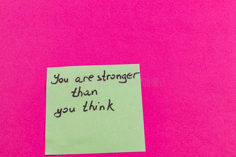 Inspirational Message on a Sticky Note Against a Vibrant Pink ...