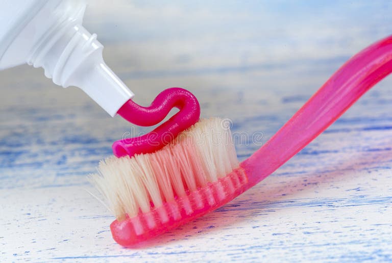 Bright Pink Toothpaste on Toothbrush Ready for Use Stock Photo - Image ...