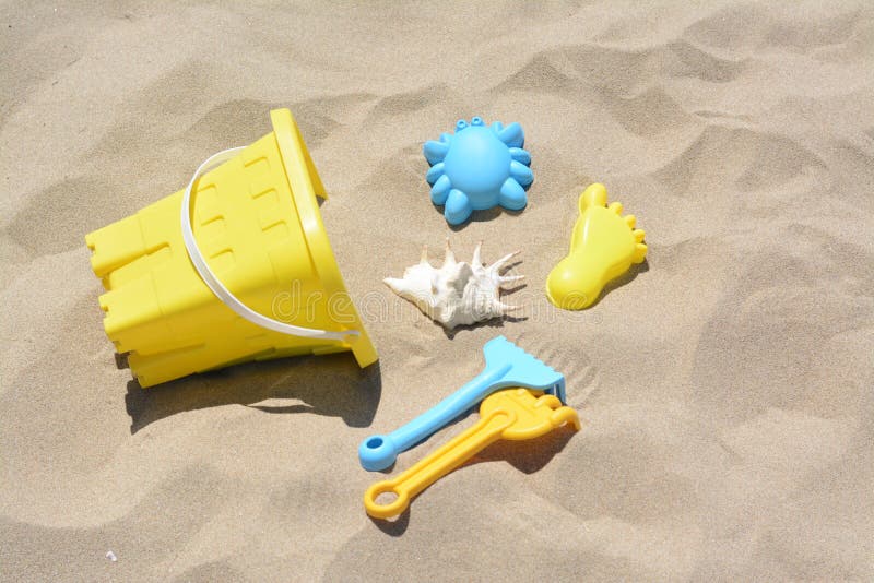 Bright Plastic Bucket and Rakes on Sand. Beach Toys Stock Photo - Image ...