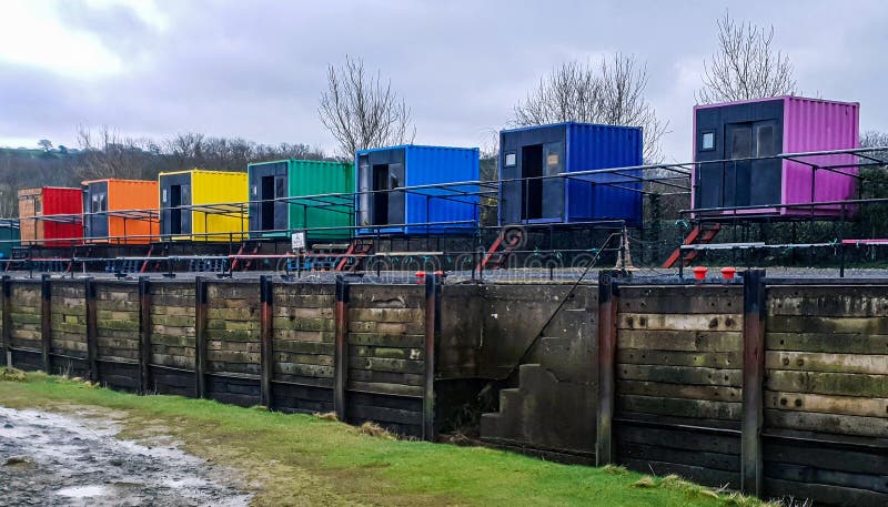 Bright Rainbow Colored Shipping Containers on Dock. Stock Image - Image ...