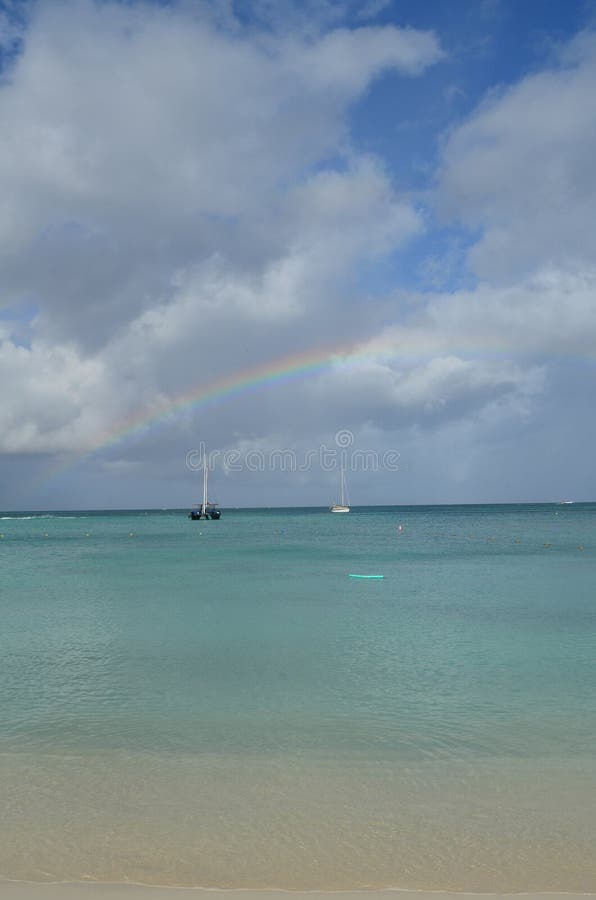 Bright Rainbow Off the Beach of Aruba Stock Image - Image of peace ...