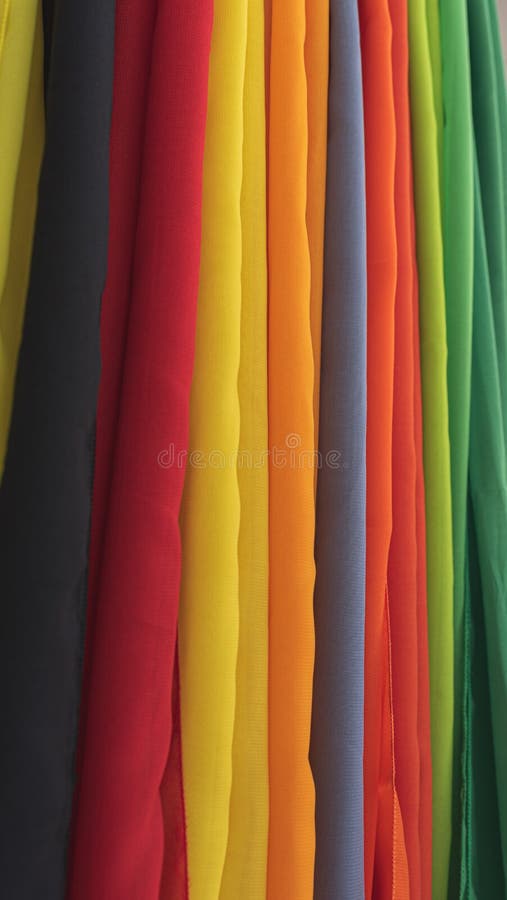 Bright Rainbow Textile Fabric Hanging Up in a Market Stock Photo ...