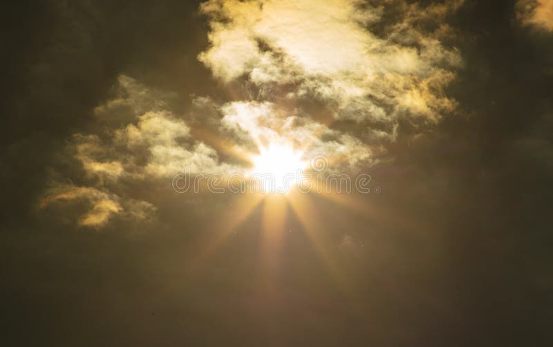 Bright Rays of the Sun on the Sky with Clouds. Stock Photo - Image of ...