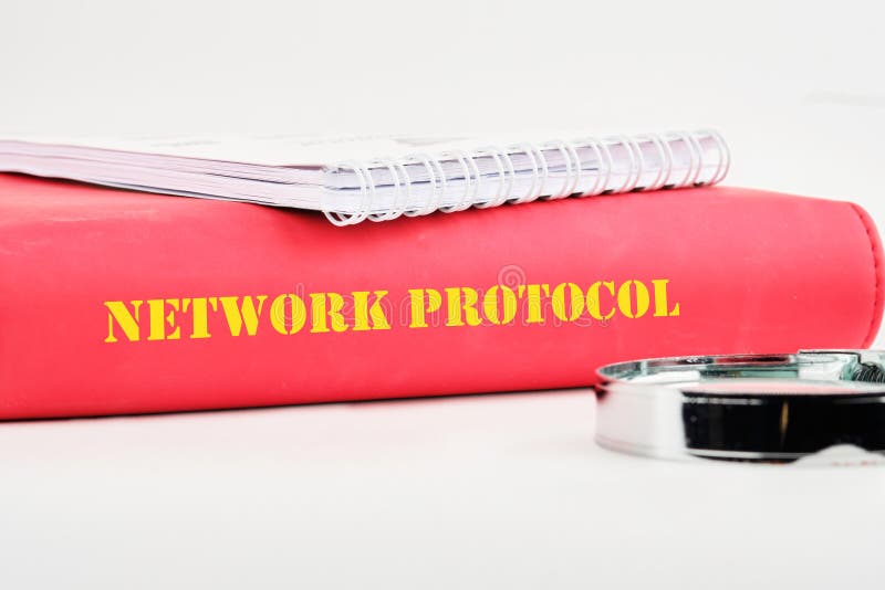 A Bright Red Binder Labeled Network Protocol Lies Open on a Clean ...