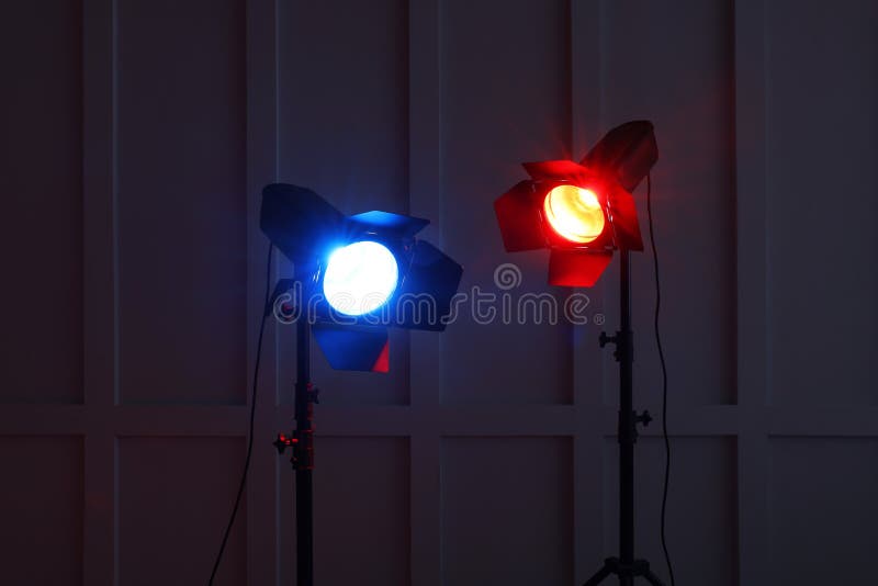 Bright Red and Blue Spotlights Near Wall in Dark Room Stock Image ...