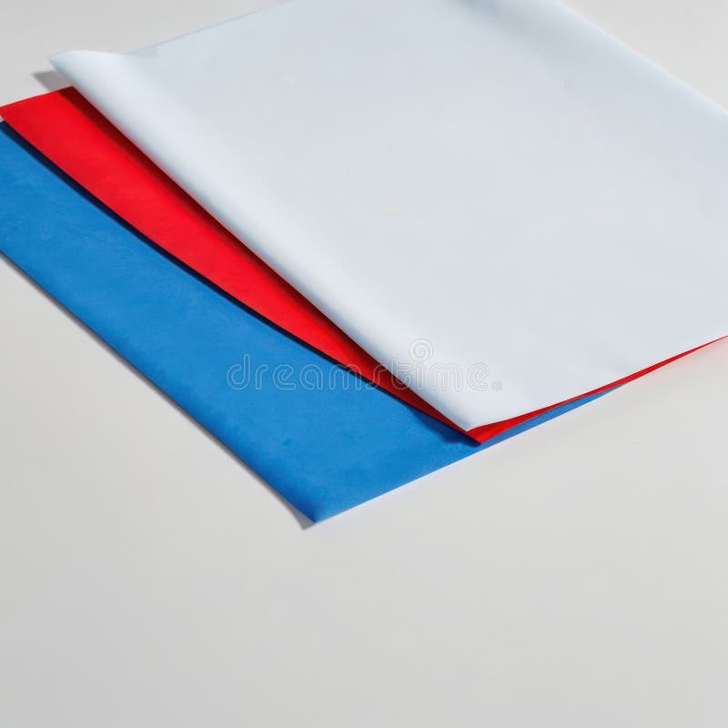 Bright Red, Blue, White Sheets of Clean Smooth Paper Lie on a White ...