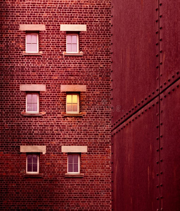 Bright Red Brick Building with Windows Stock Image - Image of ...