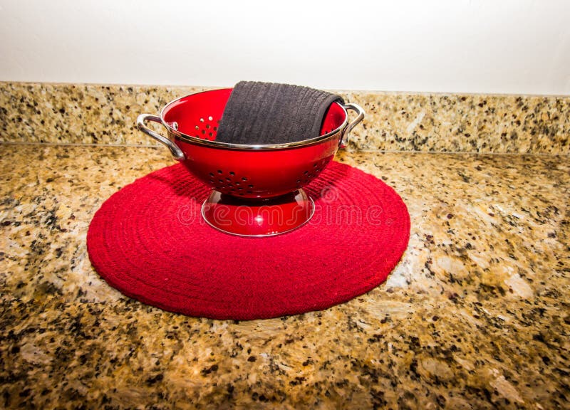 Bright Red Colander on Modern Granite Kitchen Counter Stock Photo ...