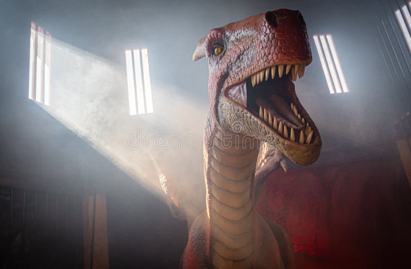 Bright Red Dragon in a Dungeon in England with Rays of Light through ...